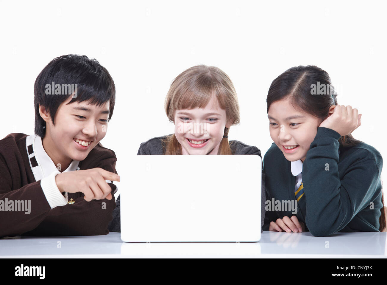 The global students looking at the laptop Stock Photo - Alamy