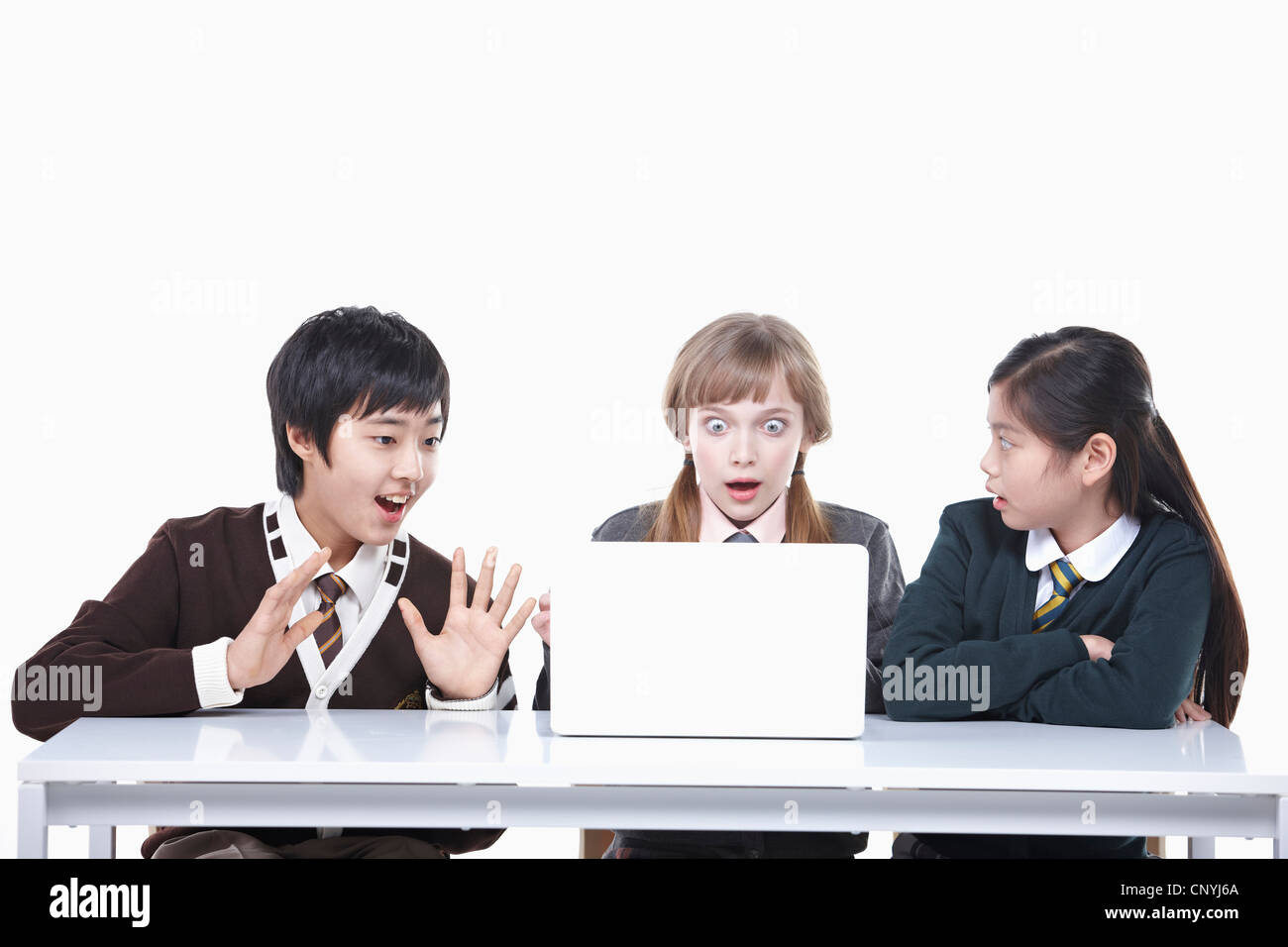The global students surprised at the laptop Stock Photo - Alamy