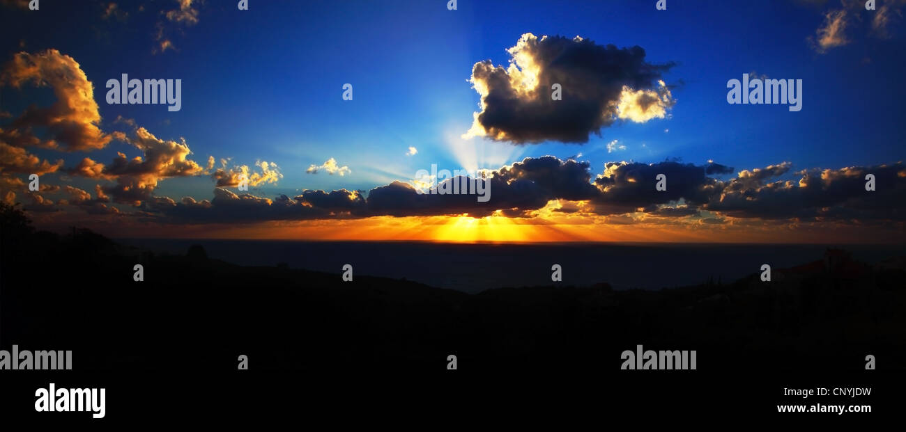 Beautiful sunset on the beach with dramatic sky & clouds, panoramic ...