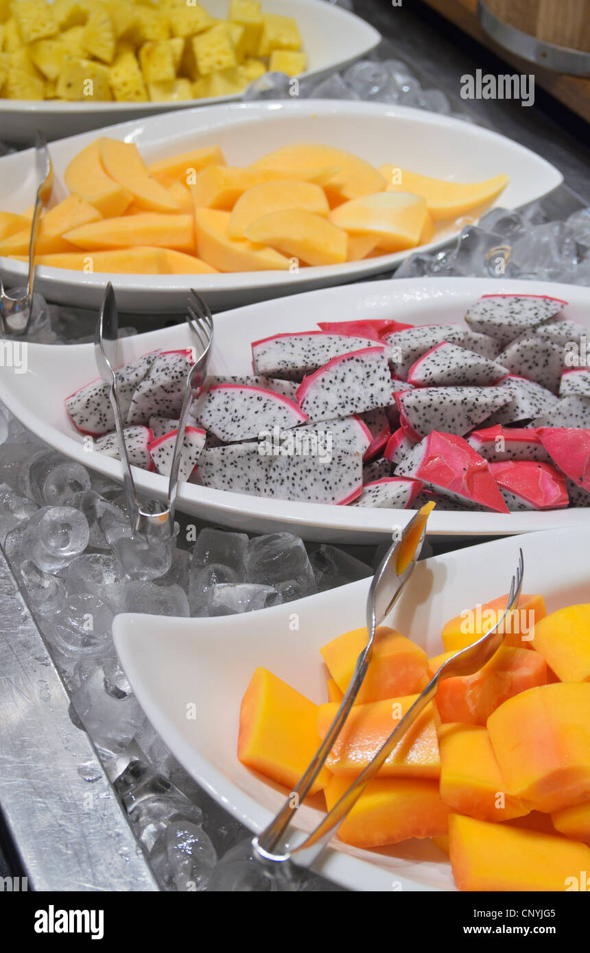 A selection of tropical fruit at a hotel breakfast bar in Thailand ...