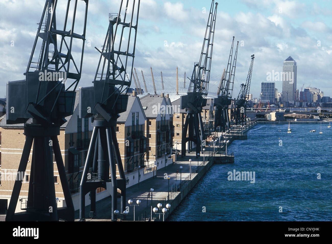 Waterfront at London Docklands showing Canary Wharf in background ...