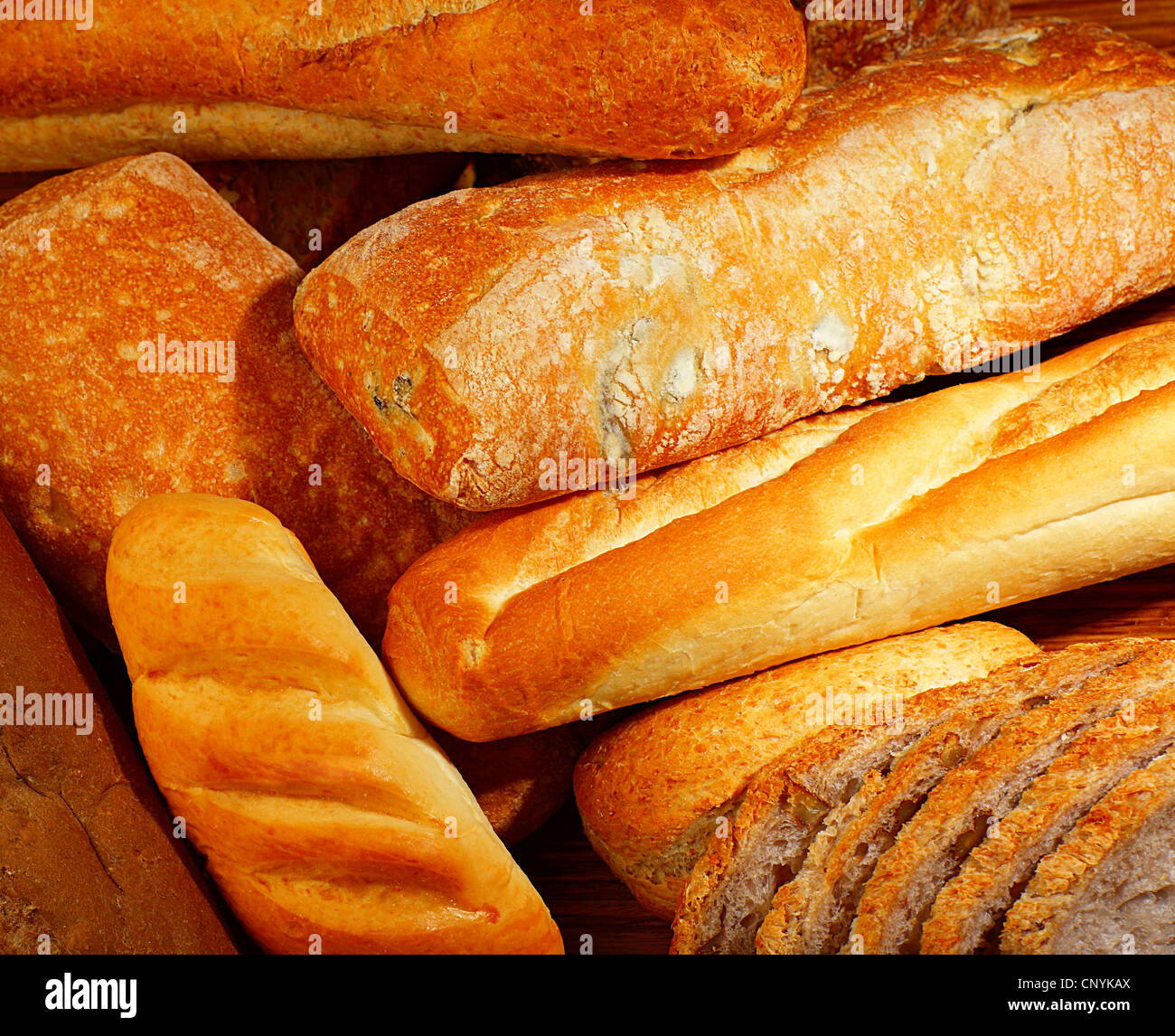 Fresh baked bread background, variety of different kind of breads, food ...