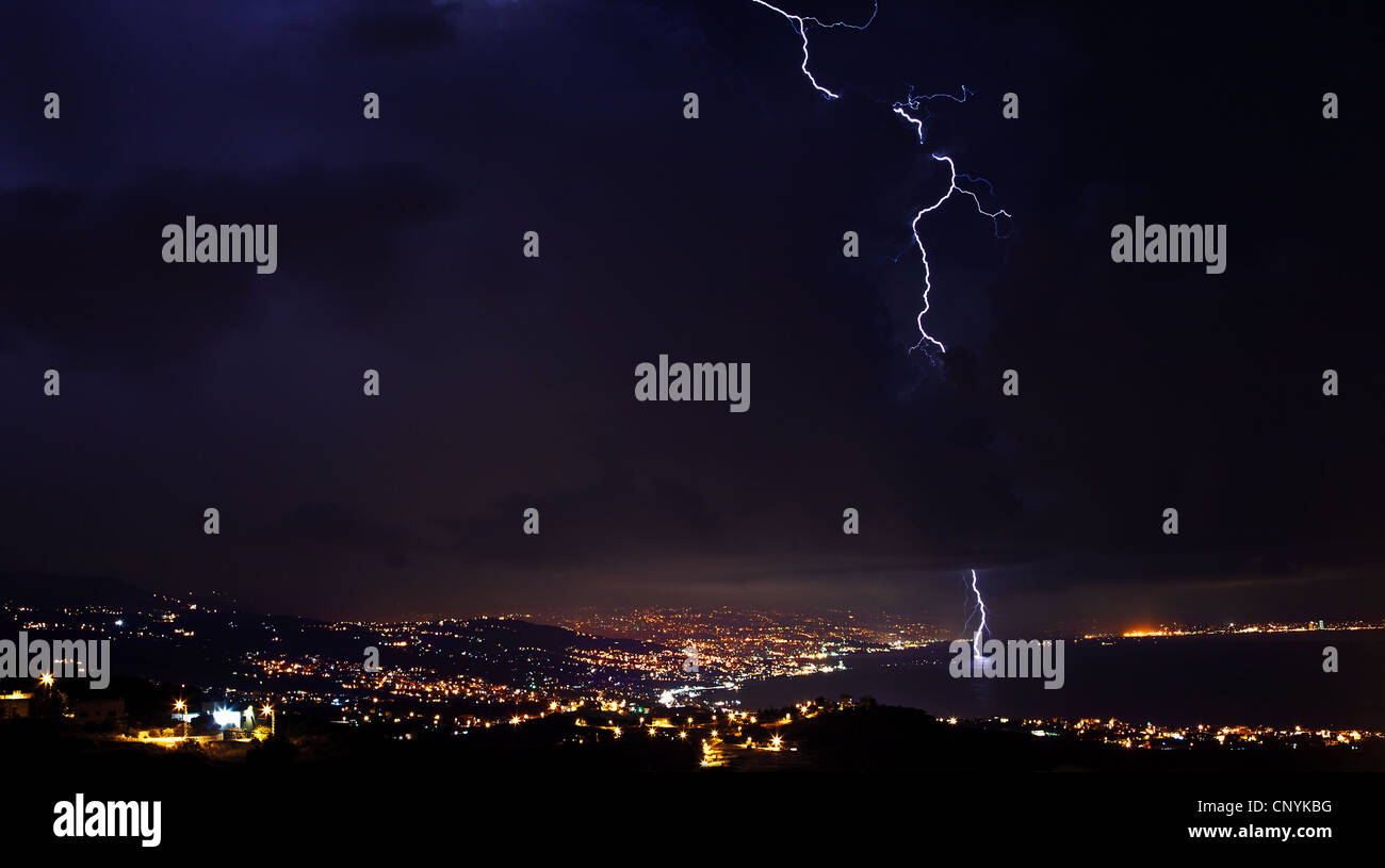 Lightning, thunderstorm at night sky, overcast winter weather with ...