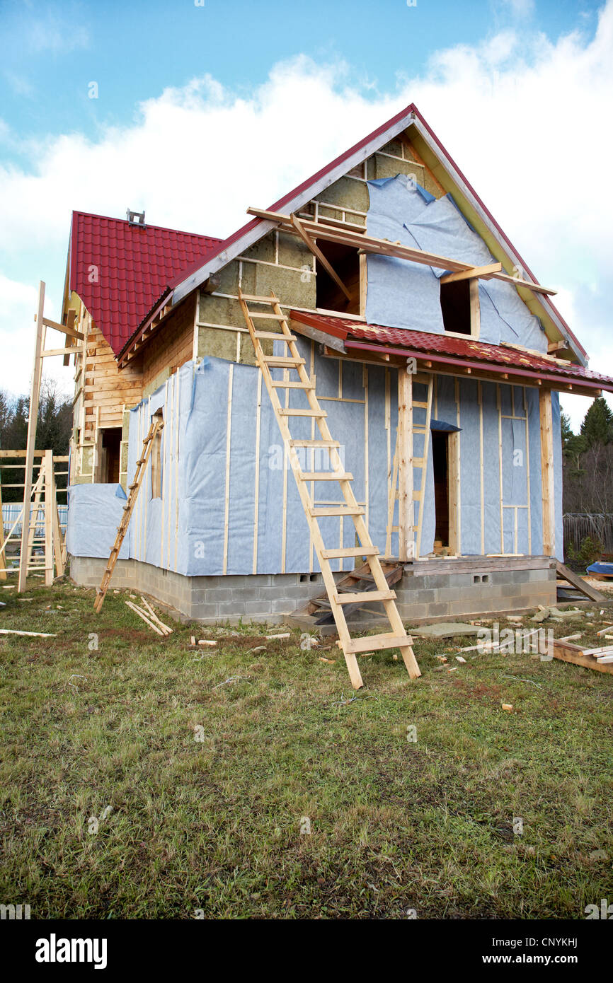 The under construction wooden house autumn Stock Photo - Alamy