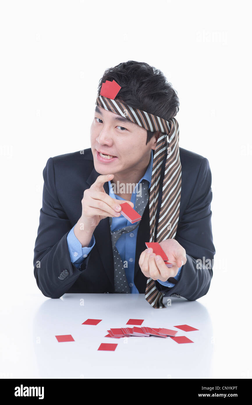 A drunk man gambling at hwatu play Stock Photo - Alamy