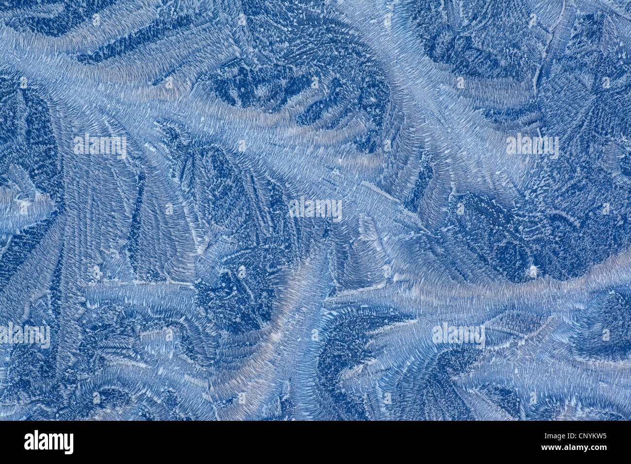 ice patterns on the inside of a window pane Stock Photo - Alamy