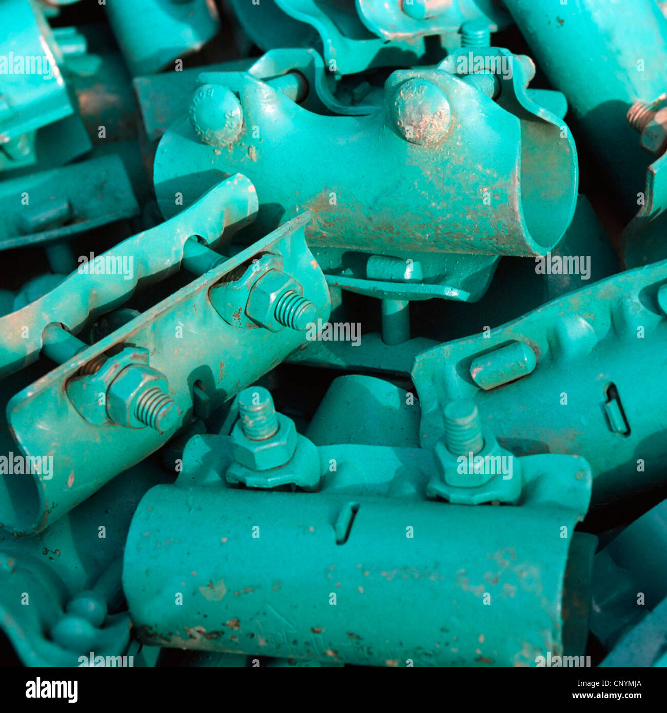Stockpile of scaffolding clamps Stock Photo - Alamy