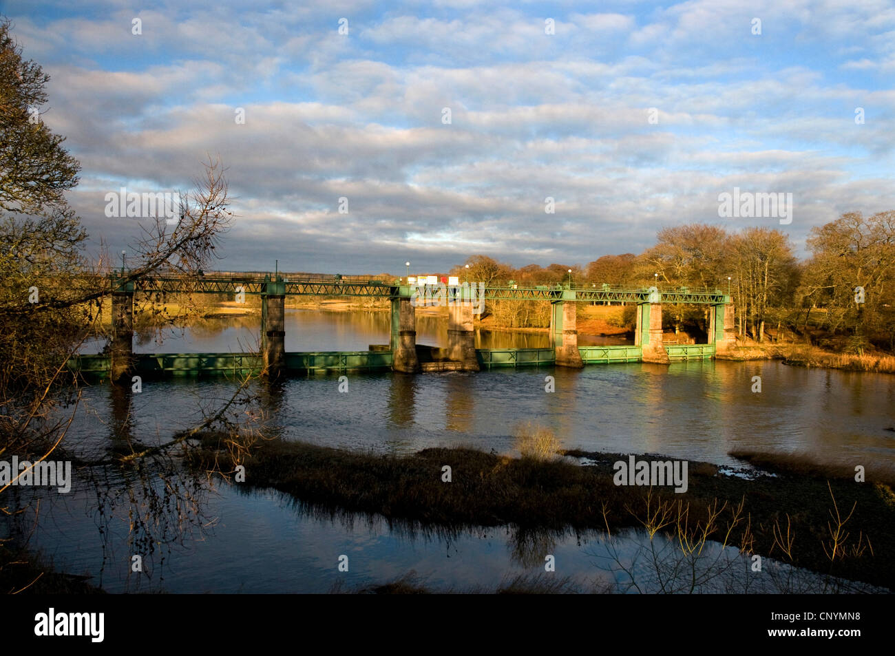 sluice gates of Glenlochar Barrage on the River Dee which is part of ...