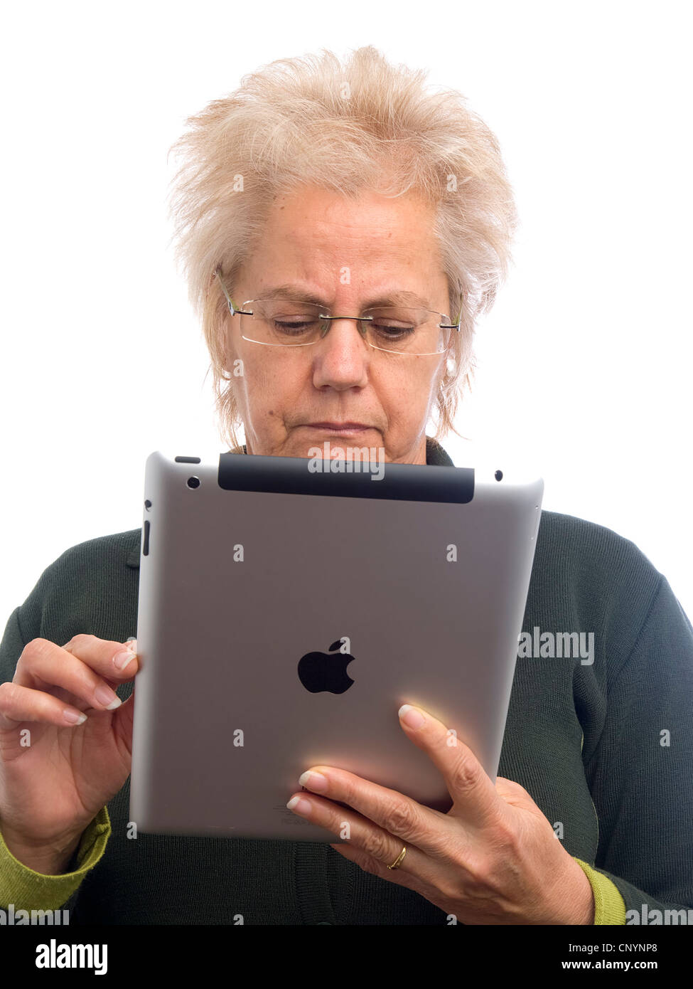 Mature woman using iPad Stock Photo - Alamy