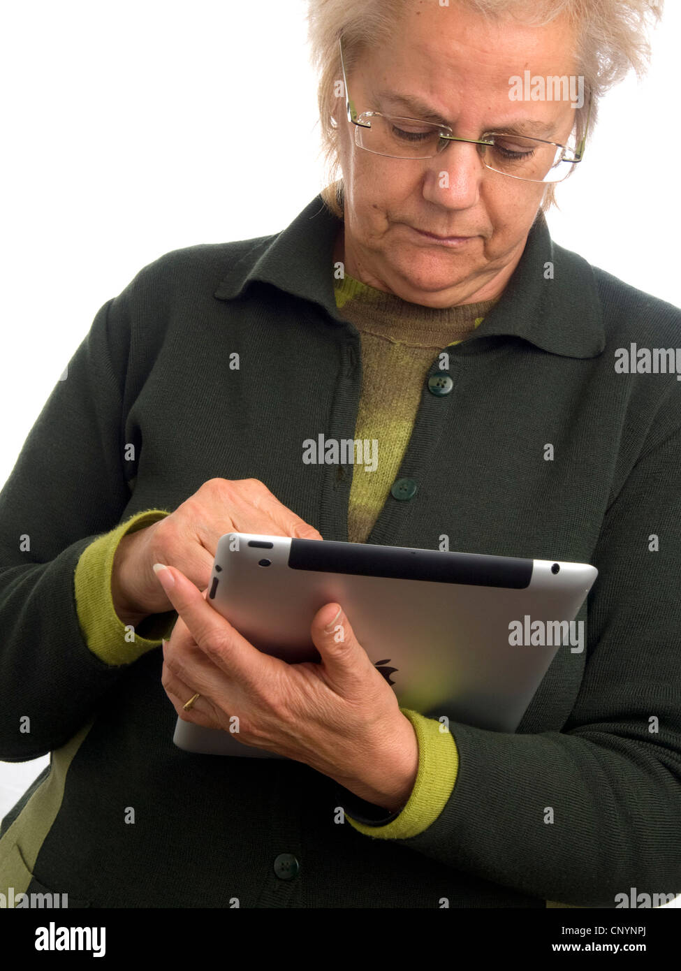 Mature woman using iPad Stock Photo - Alamy