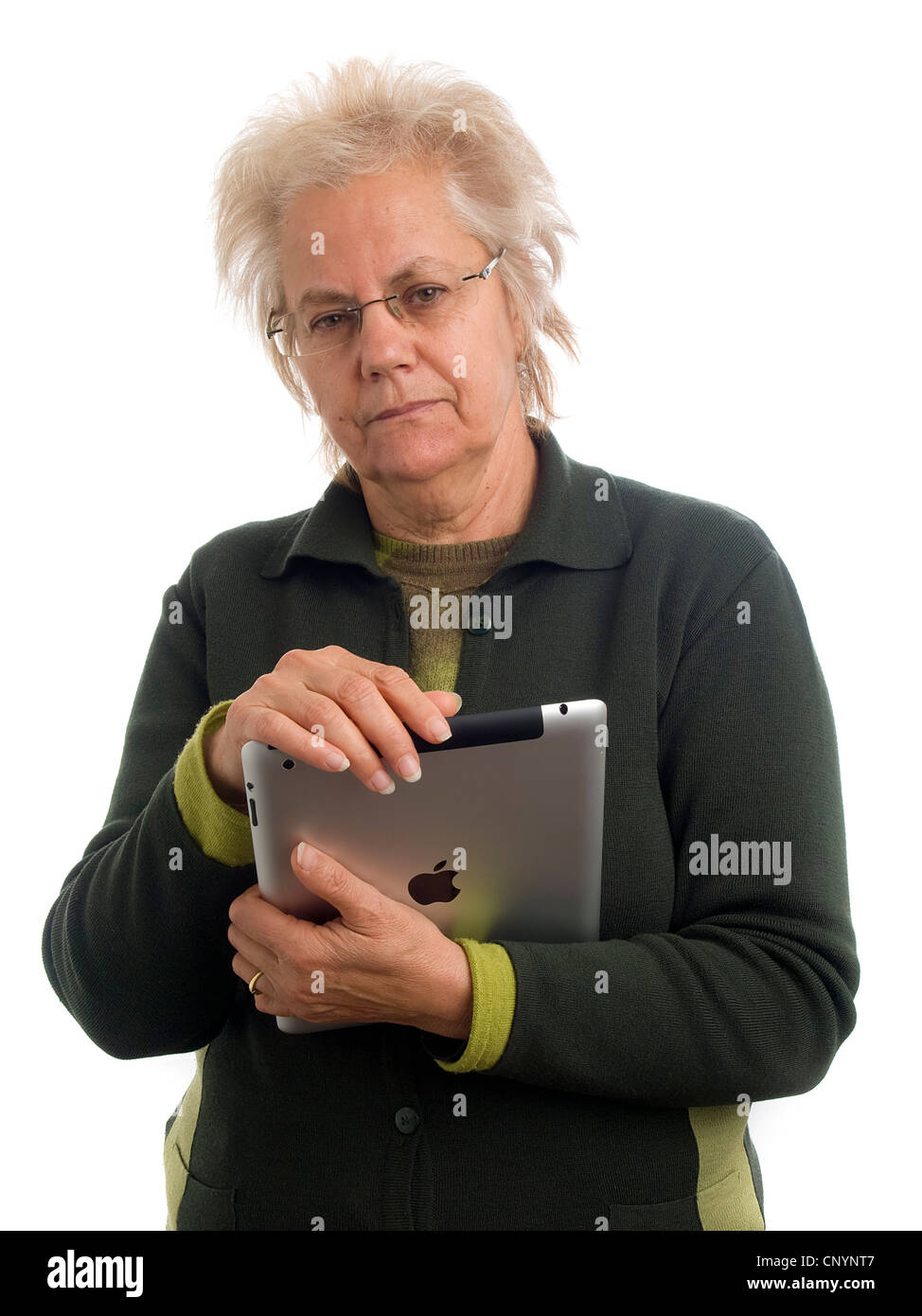 Mature woman holding iPad Stock Photo - Alamy