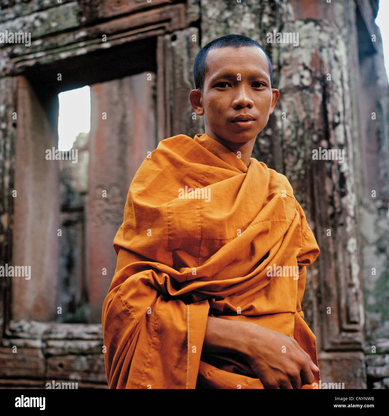 Buddhist monk at ruins of Temple, Bayon Stock Photo - Alamy