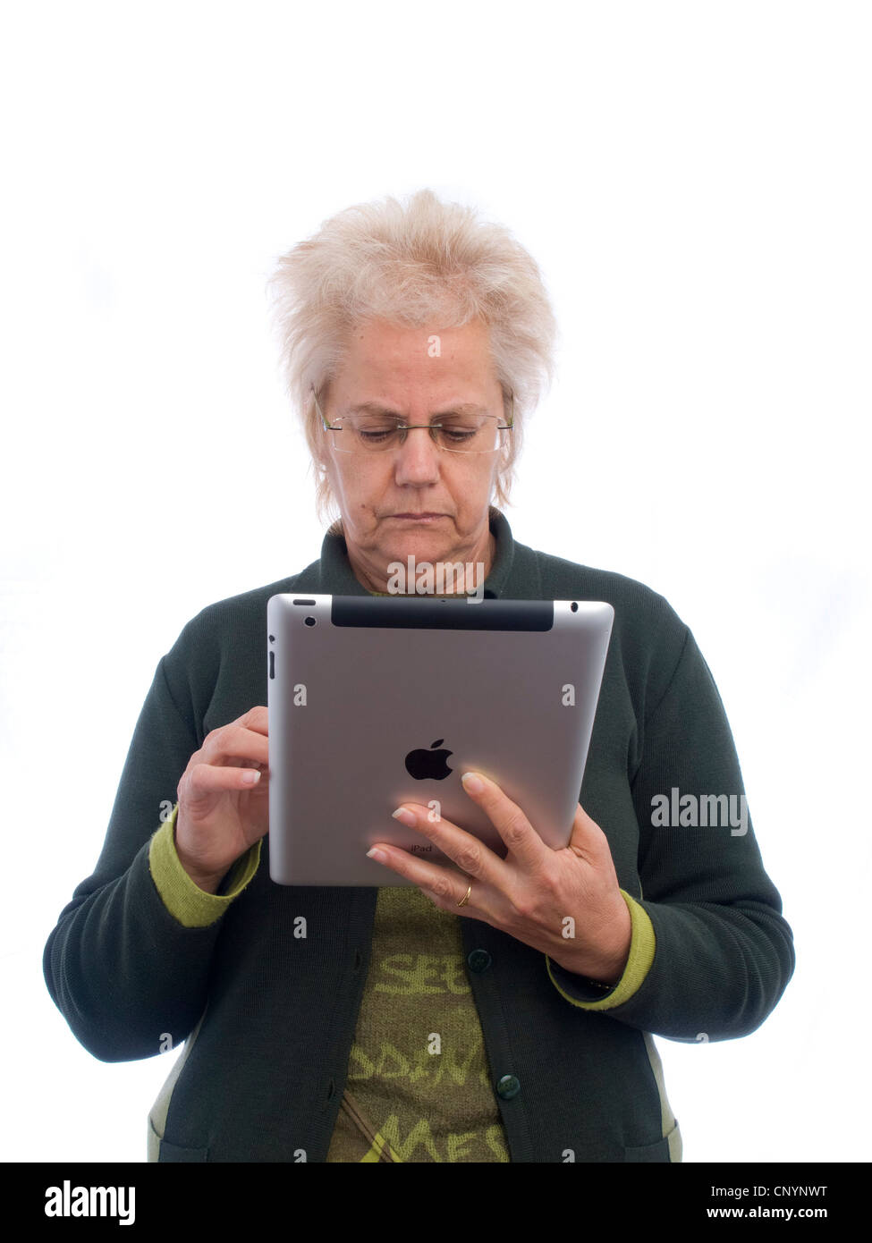Mature woman using iPad Stock Photo - Alamy