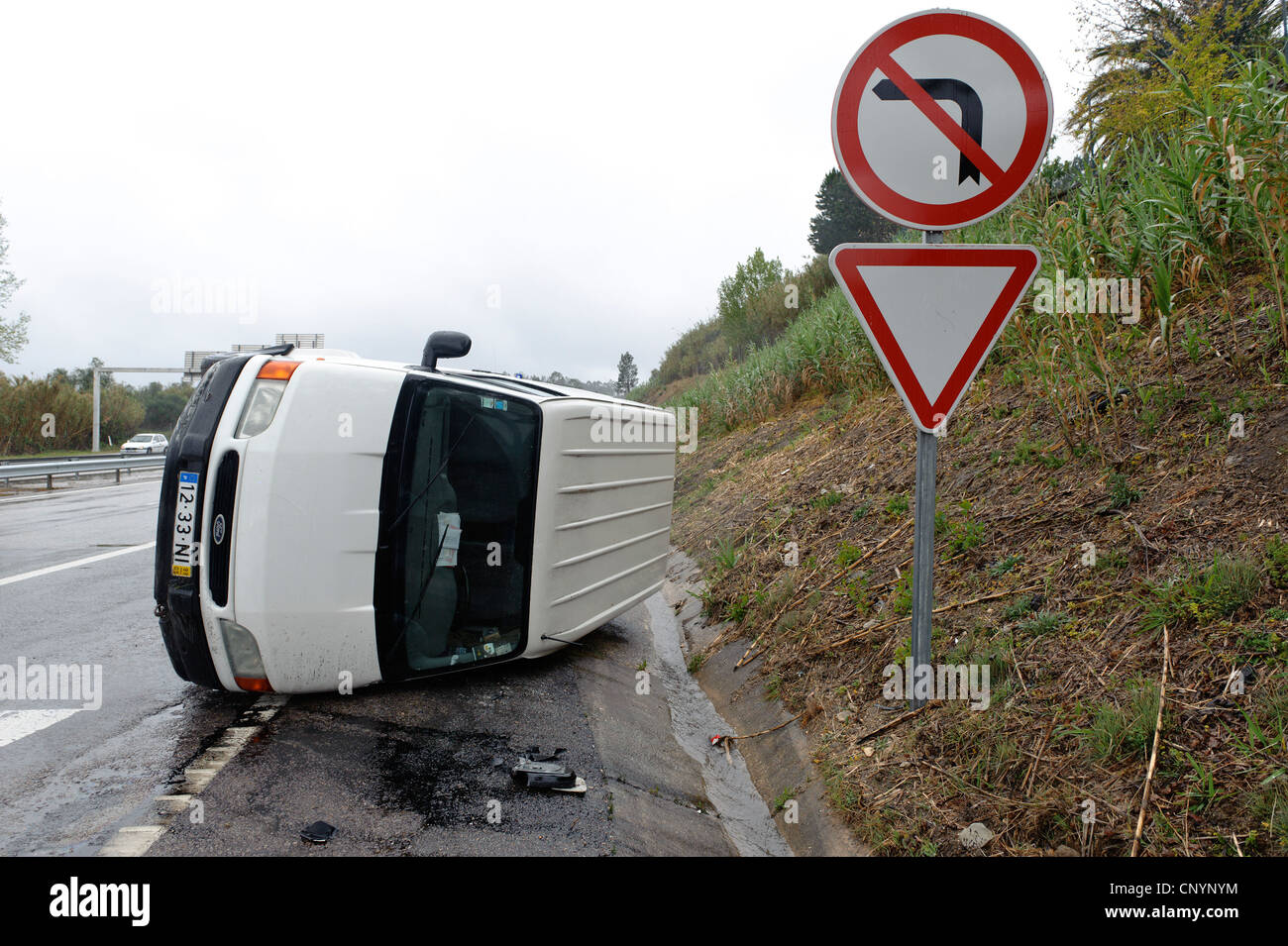 Wrecked and overturned car Stock Photo - Alamy