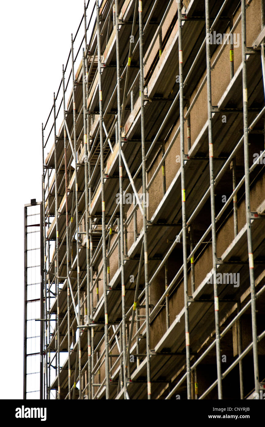 scaffolds covering a building facade Stock Photo - Alamy