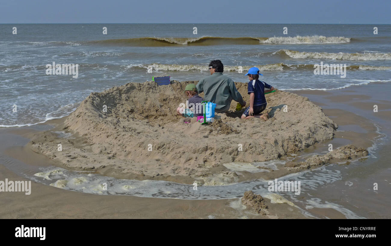 Boys Building Sand Castle High Resolution Stock Photography and Images ...