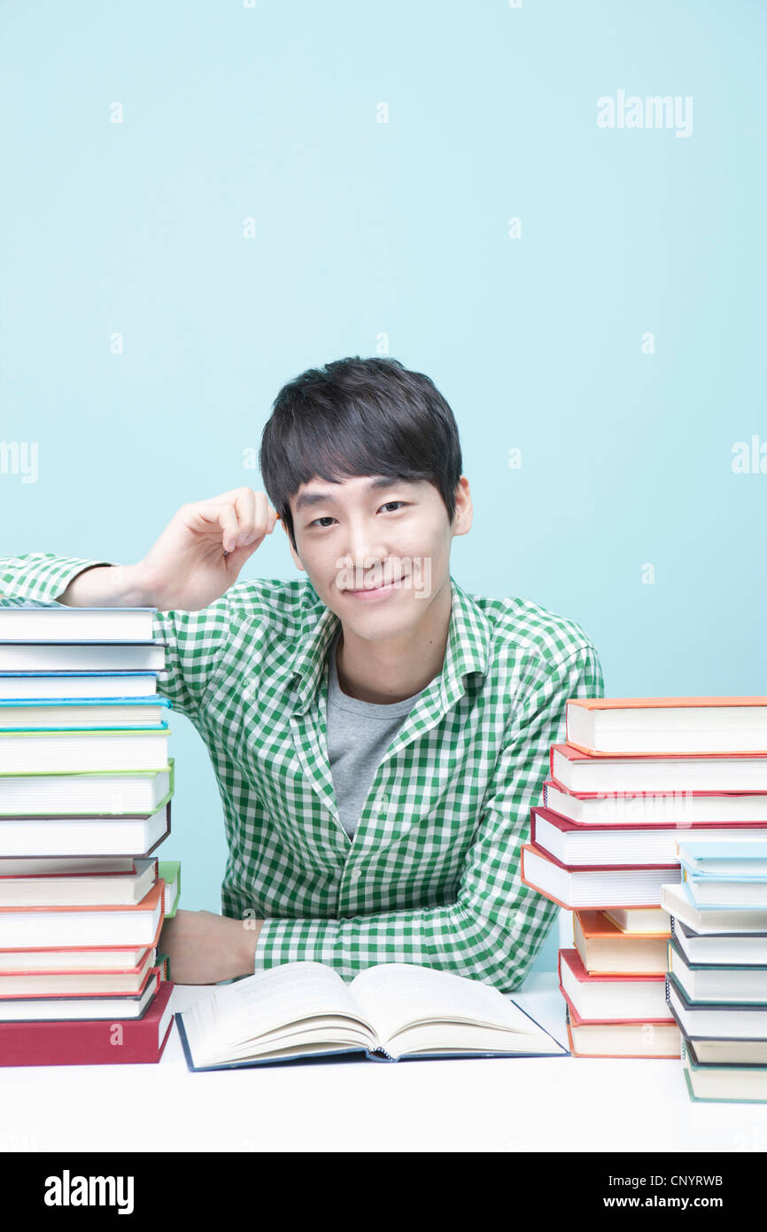 Studying man at the desk Stock Photo - Alamy Studying man at the desk Stock Photo - Alamy