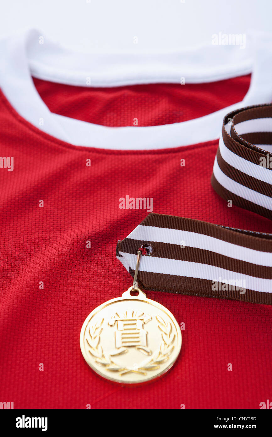 The prize medal on the national team uniform Stock Photo - Alamy