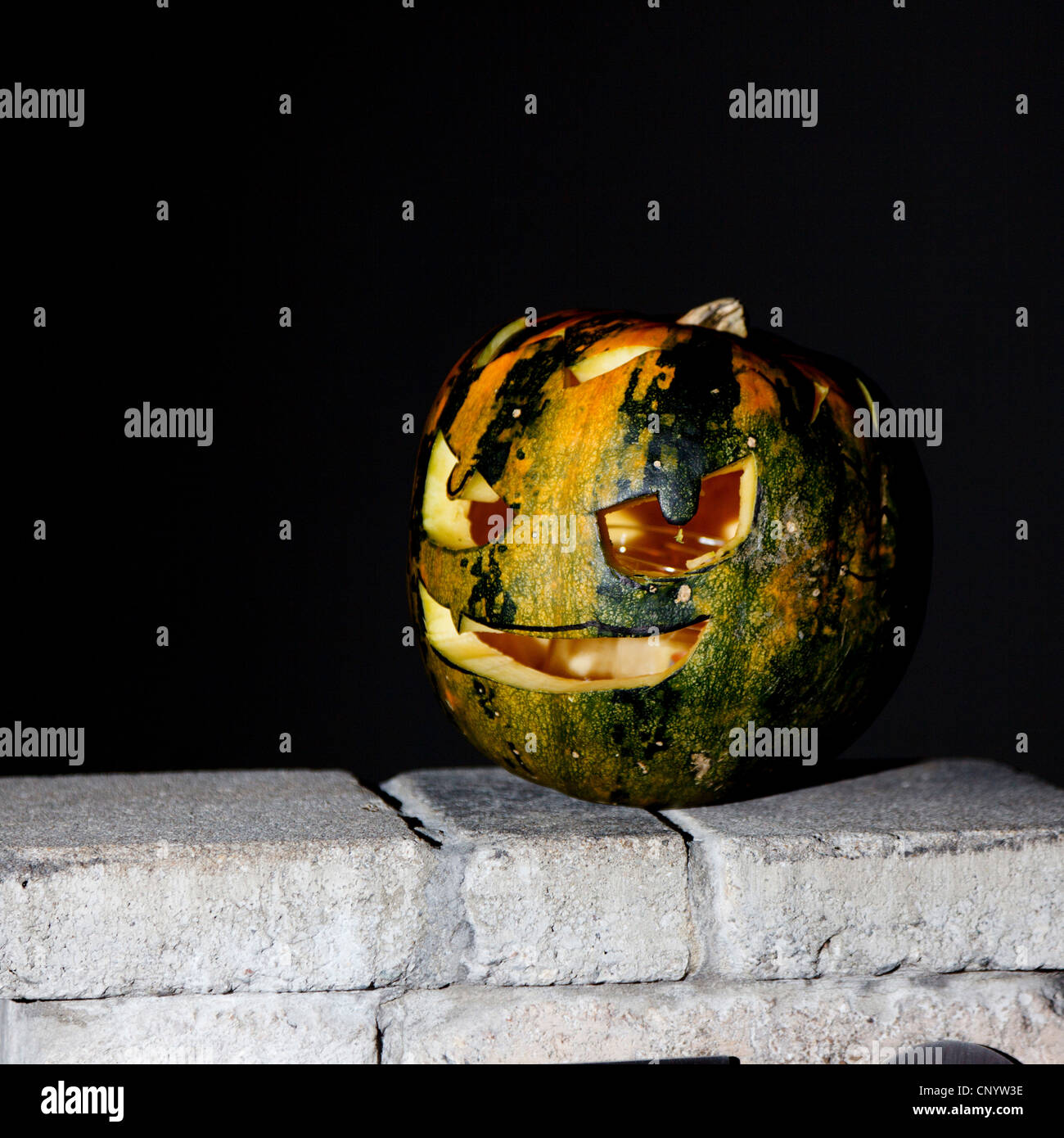 halloween pumpkin on a wall Stock Photo - Alamy