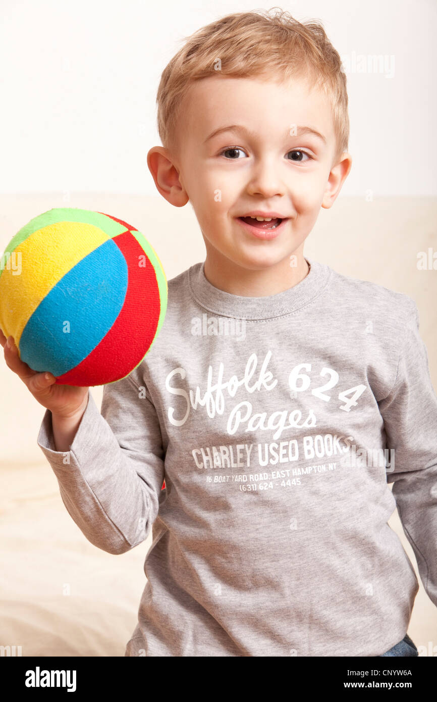 child playing with ball Stock Photo - Alamy