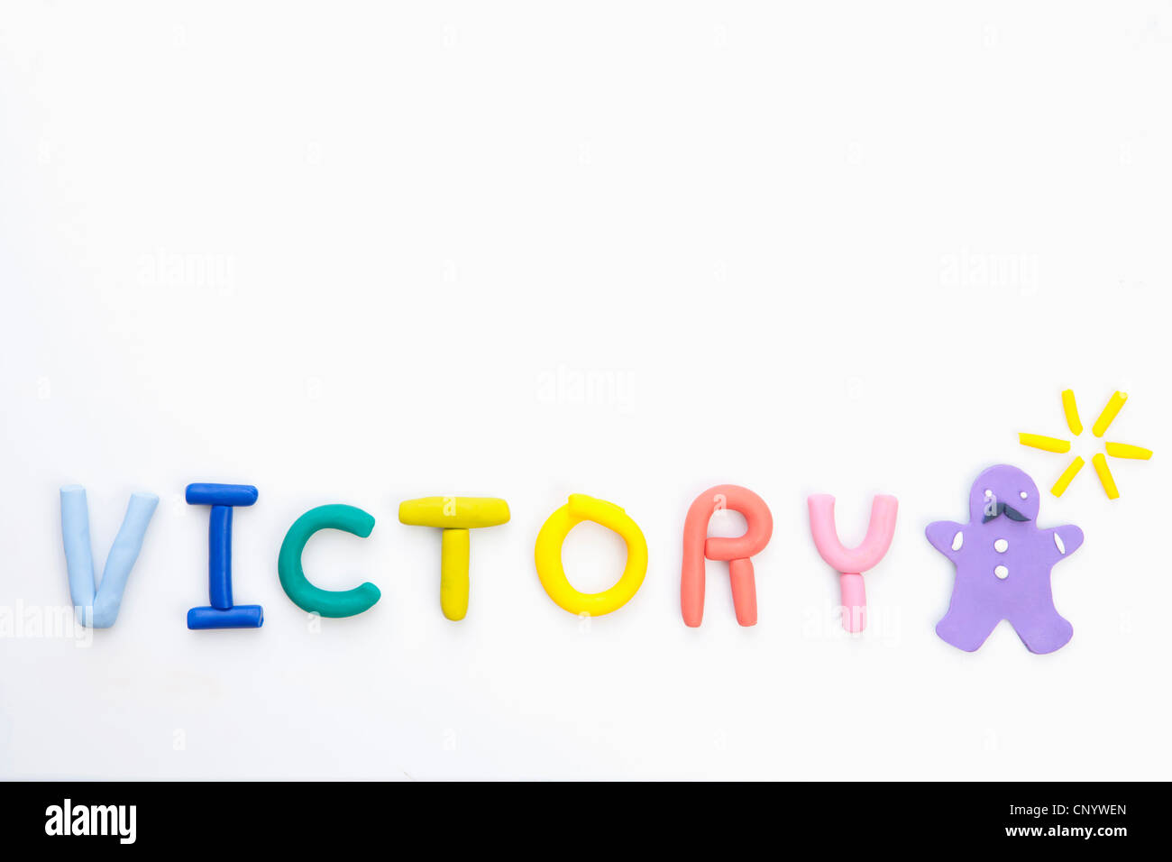 The colorful clay 'VICTORY' with clay man Stock Photo - Alamy