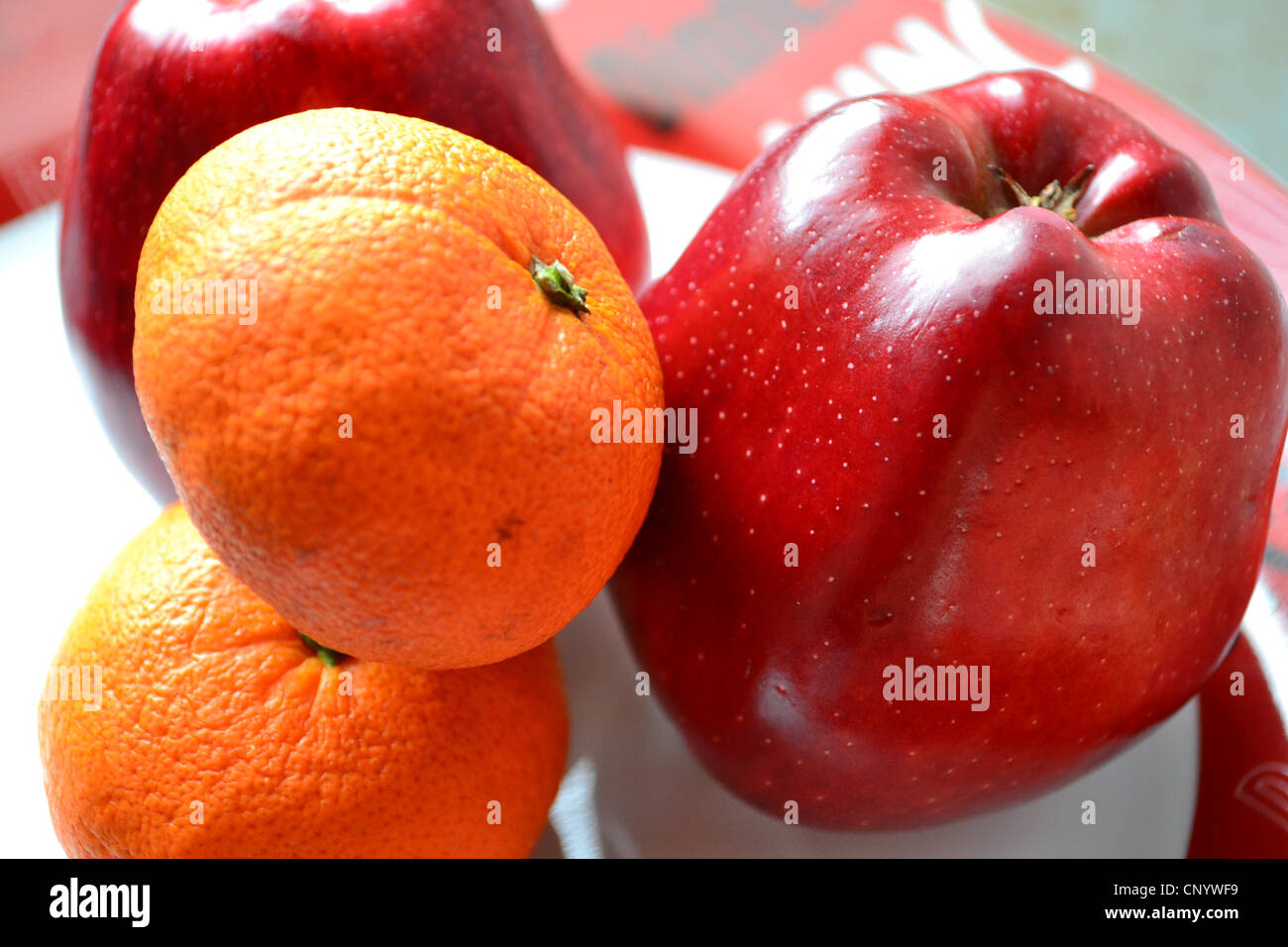 Red Apples and Oranges Stock Photo - Alamy