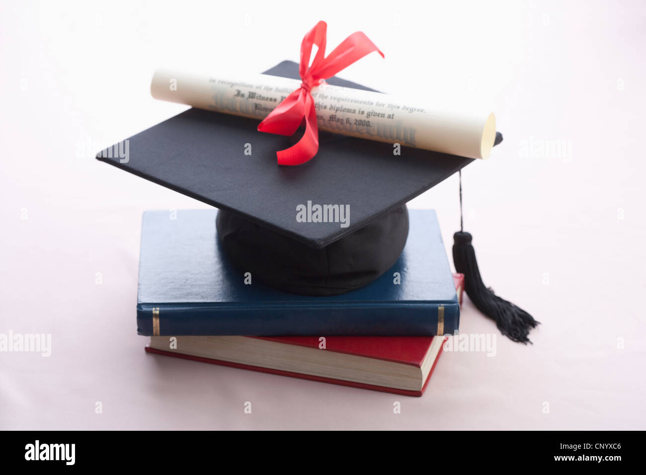Books tied with ribbon hi-res stock photography and images - Alamy