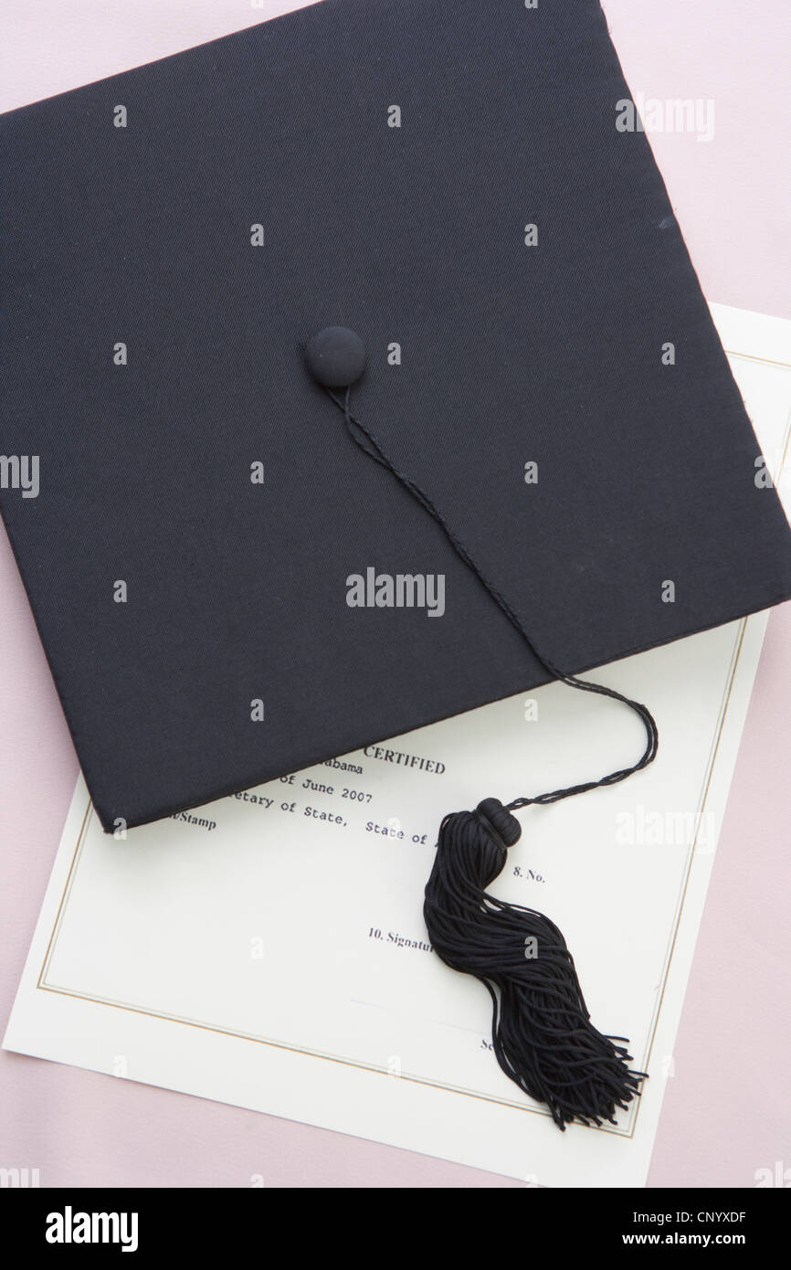 The graduation cap and the diploma Stock Photo - Alamy