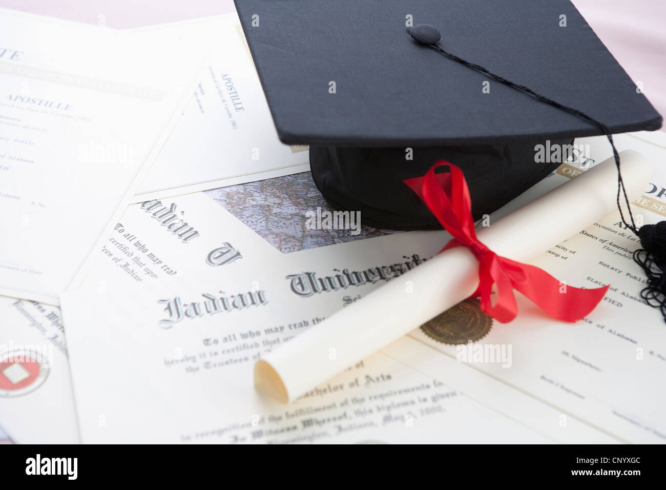 The graduation cap and the diploma Stock Photo - Alamy