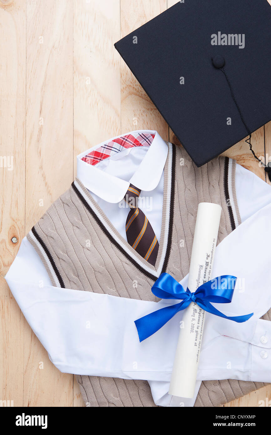 The graduation cap, school uniform, and diploma Stock Photo - Alamy