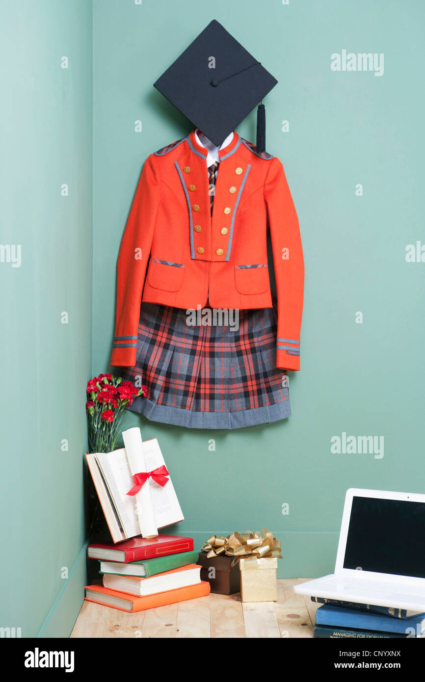 The graduation cap, school uniform, gift, and diploma Stock Photo - Alamy