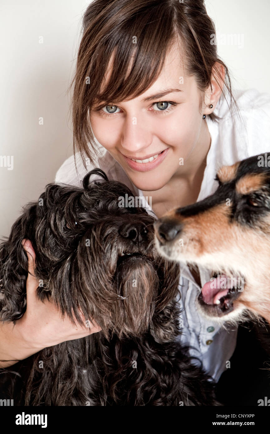 smiling woman with two dogs Stock Photo - Alamy