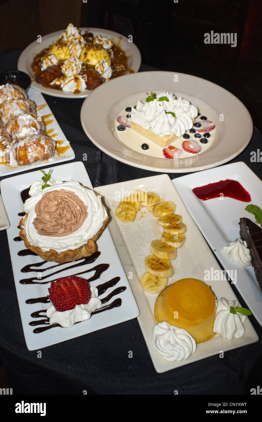 Display of different kinds of dessert in a restaurant Stock Photo - Alamy