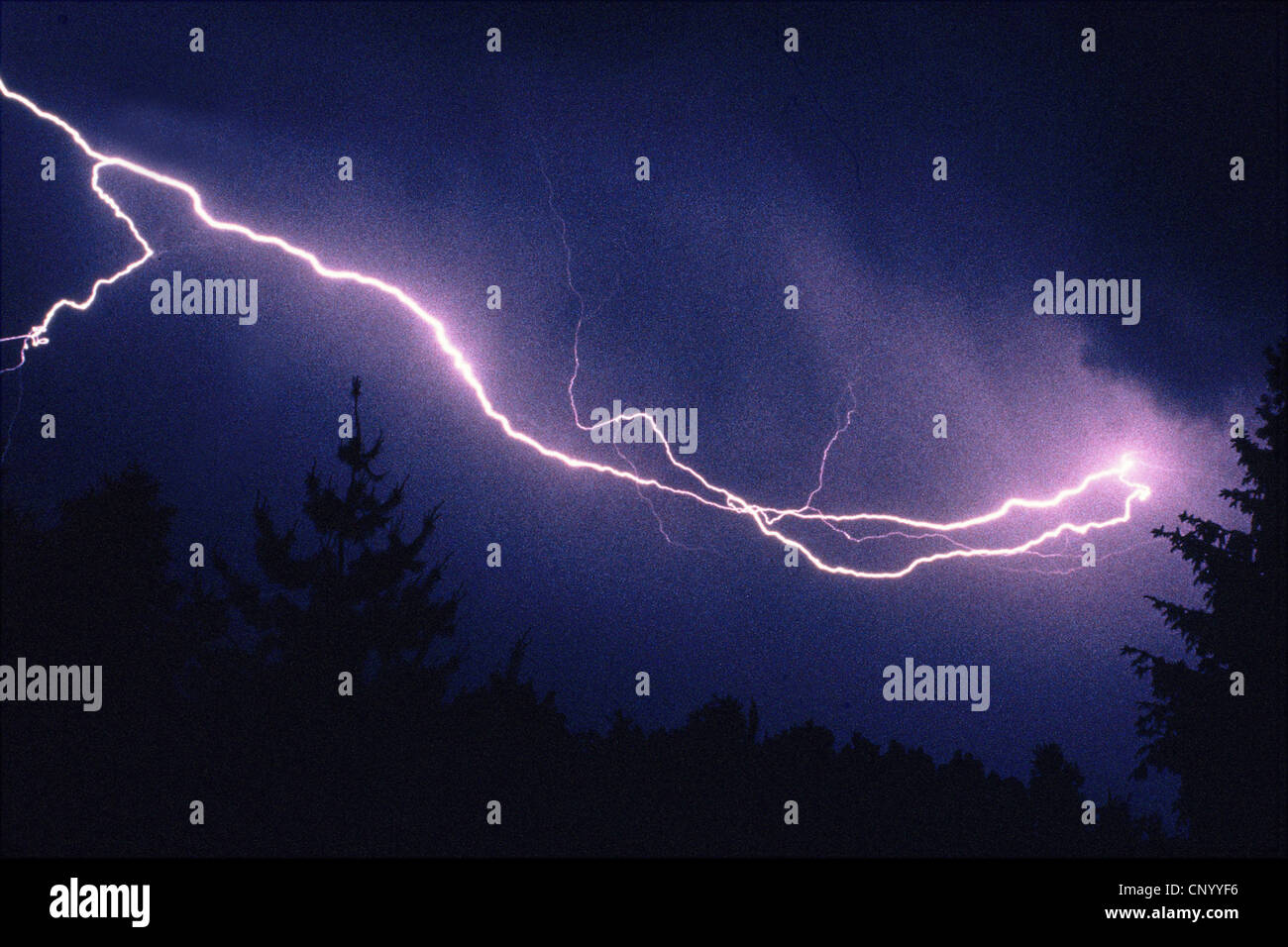 lightning during a thunderbolt at the night sky, Germany, North Rhine ...