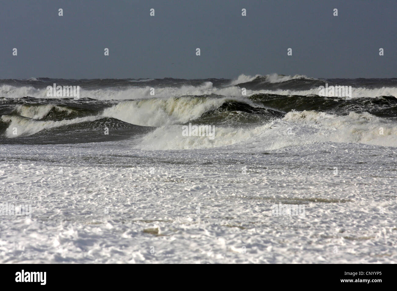 breaking of the waves at the sand beach at stormy sea, Germany ...