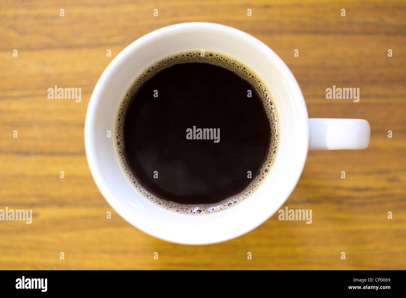 Over head view of a cup with coffee in it Stock Photo - Alamy