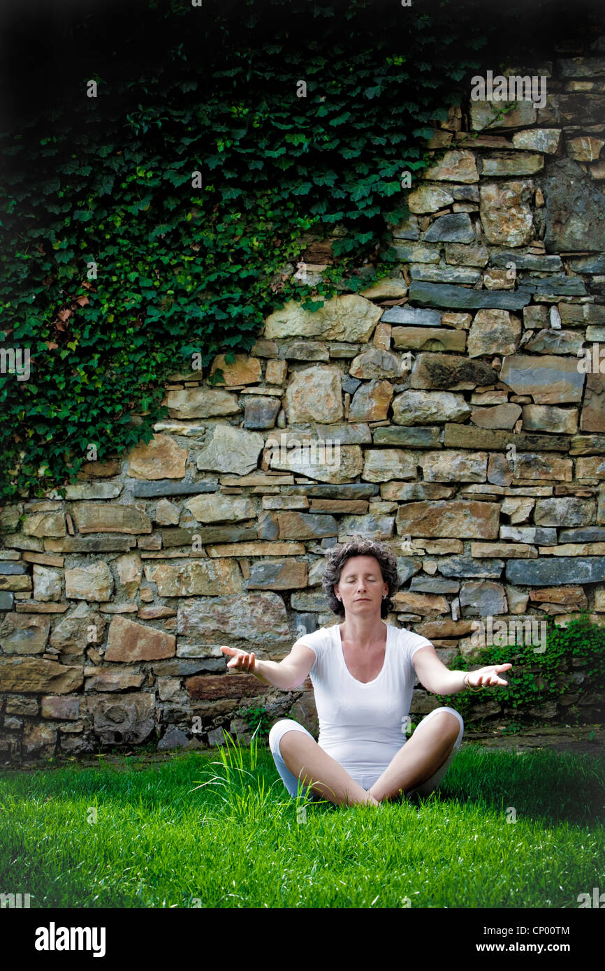 woman doing yoga Stock Photo - Alamy