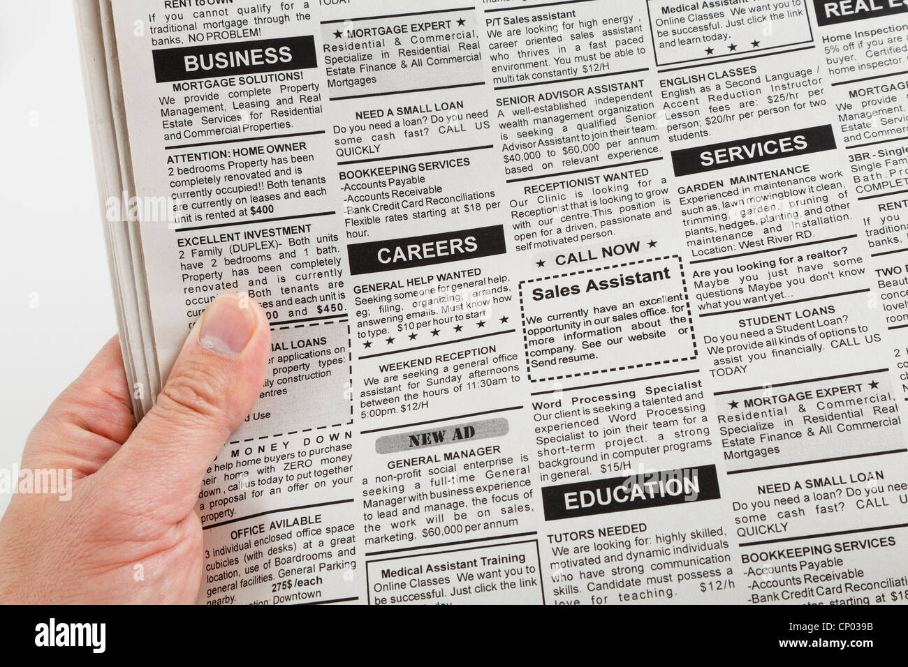Fake Classified Ad, newspaper, business concept Stock Photo - Alamy