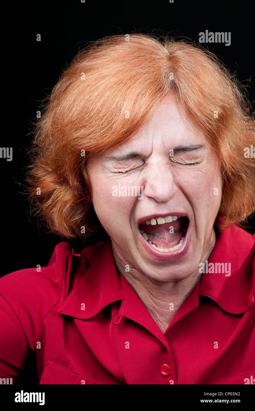 Middle aged woman shouting Stock Photo - Alamy