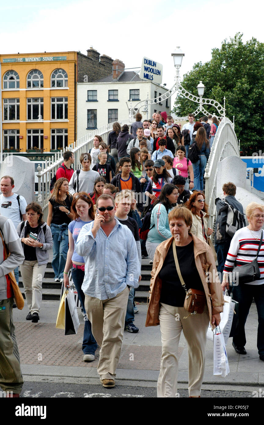 Dublin's landmark pedestrain Ha'penny Bridge crosses the Liffey. Built ...