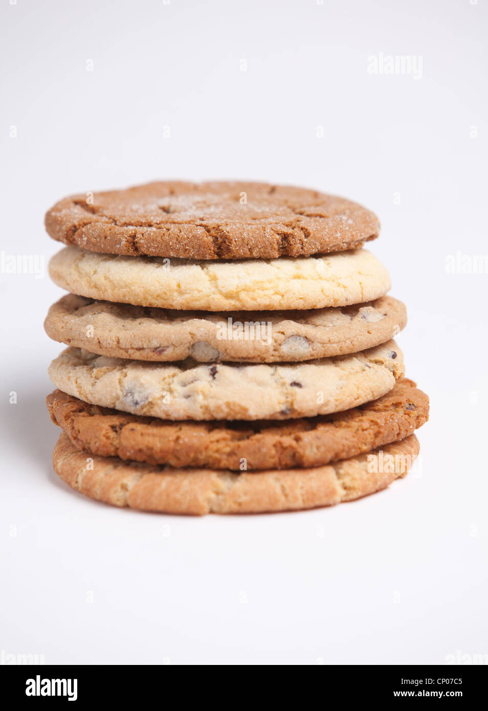 Assorted cookies stacked in the studio Stock Photo - Alamy