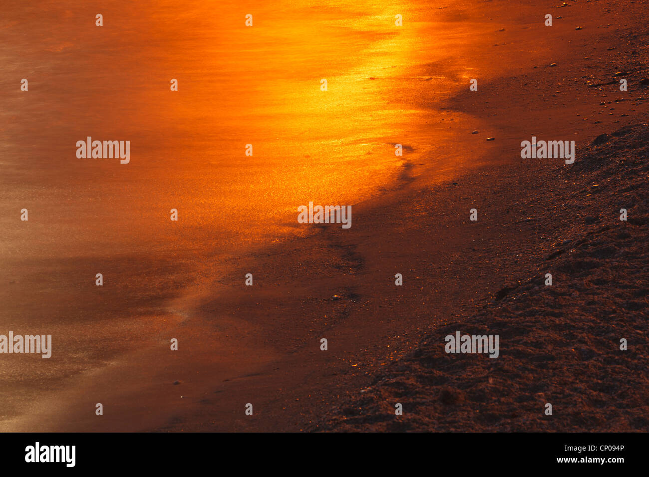 Setting sun reflected in sea hi-res stock photography and images - Alamy