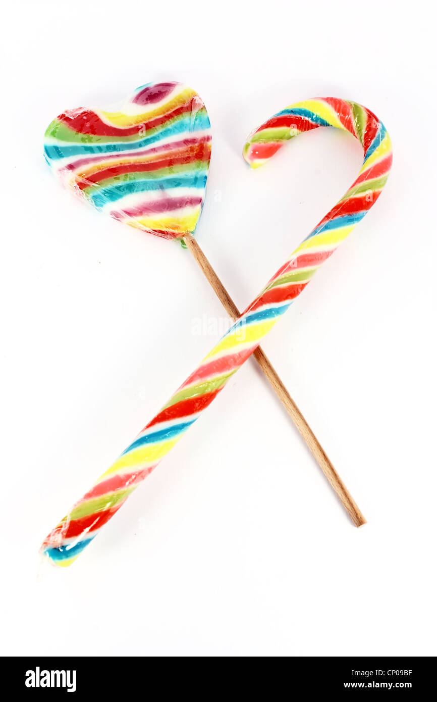 Two colorful lollipops sweet candy Stock Photo - Alamy