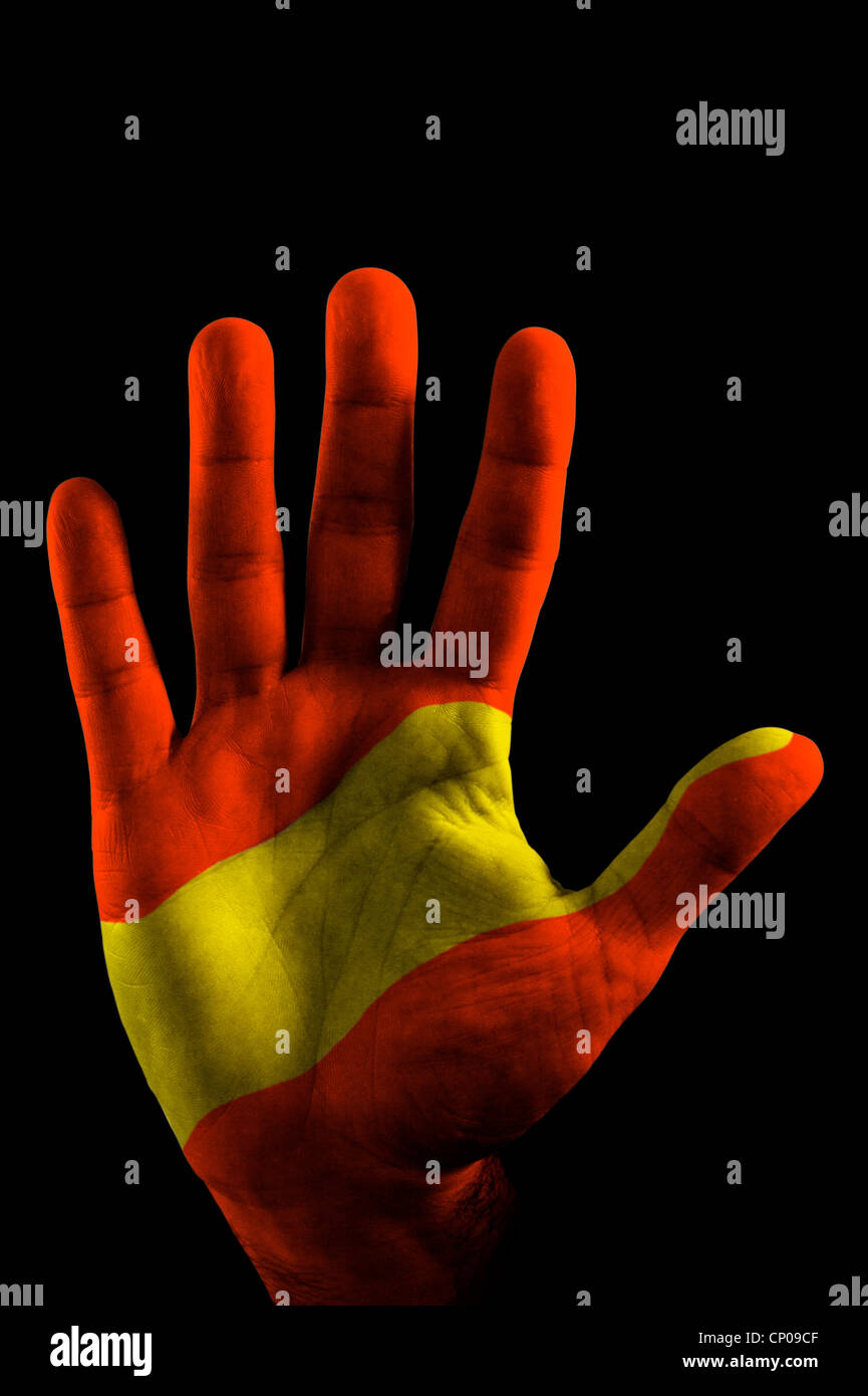 PAINTED HANDs FLAG's - Spain Red and Yellow color Stock Photo - Alamy