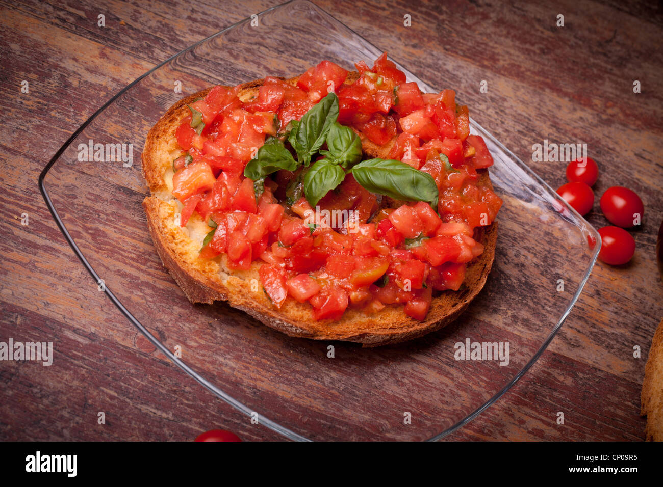 Frisella With Tomatoes And Basil Stock Photo - Alamy