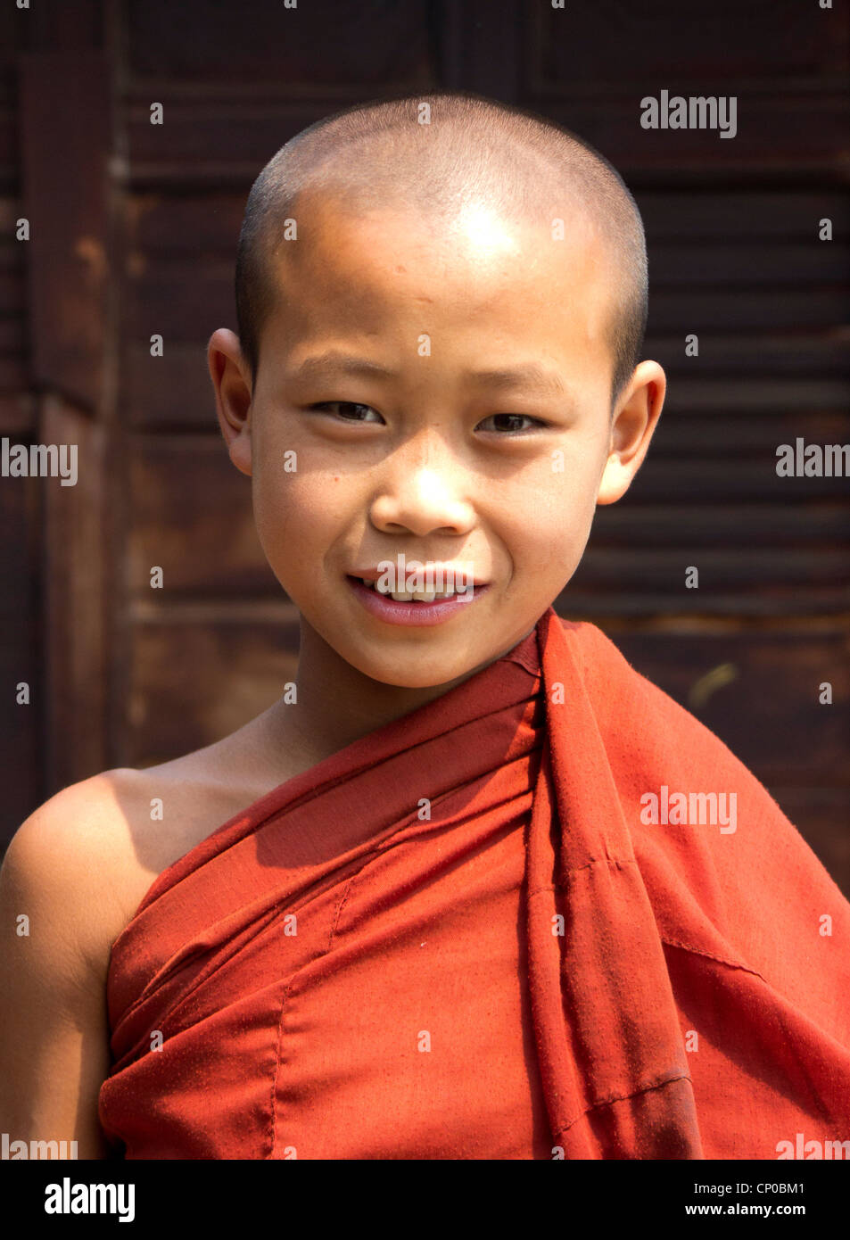 Portrait of a young boy as a monk Stock Photo - Alamy