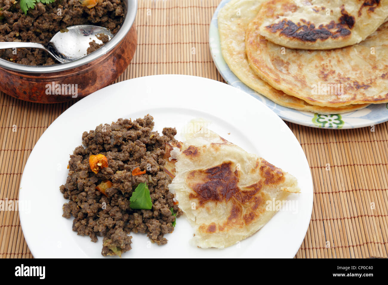 A minced beef north Indian or Pakistani keema curry served with paratha ...