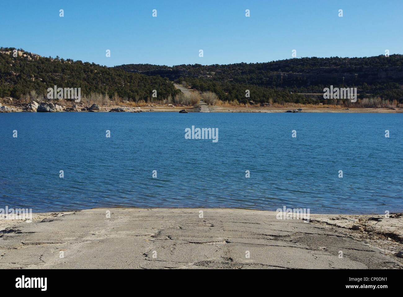 Road disappearing in Recapture Reservoir, Utah Stock Photo - Alamy