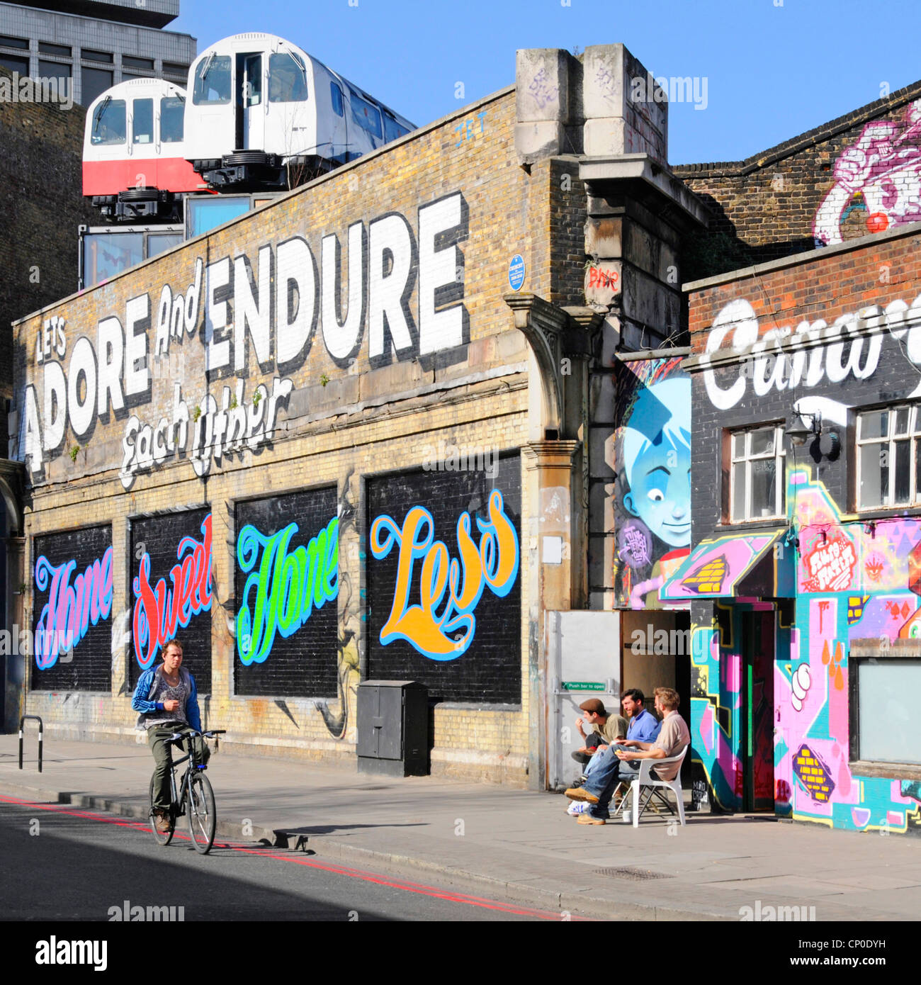 Recycled tube train carriages used as artists studios perched above old ...