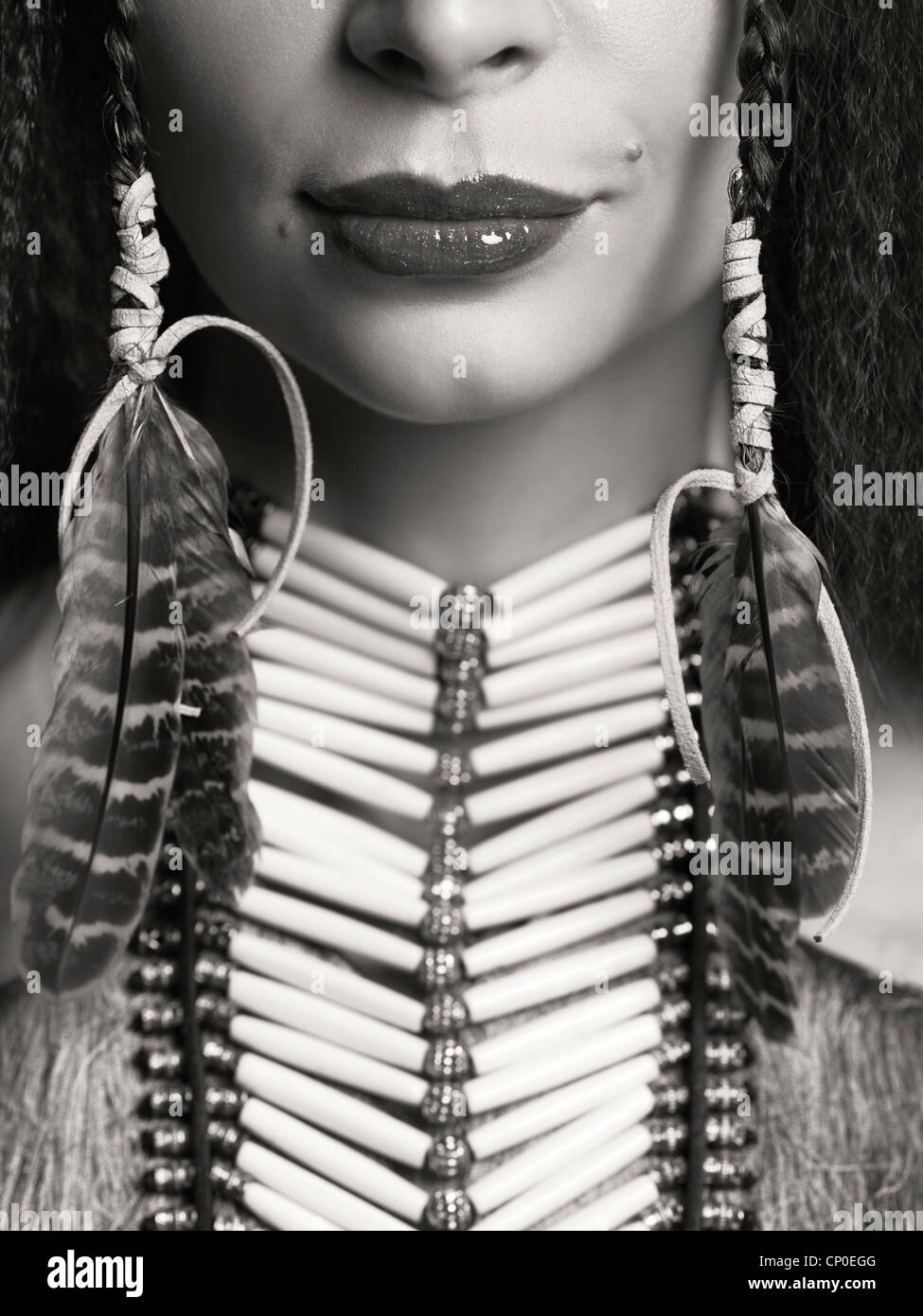 Woman wearing native american accessories hi-res stock photography and ...